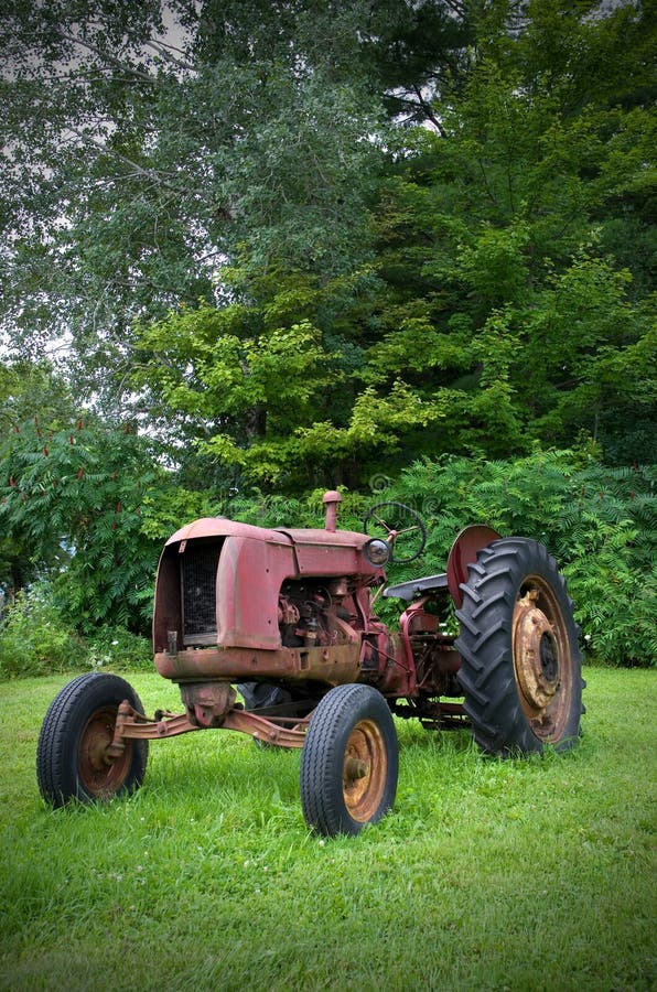 Old Vintage Red Farm Tractor in the Forest Stock Image - Image of ...