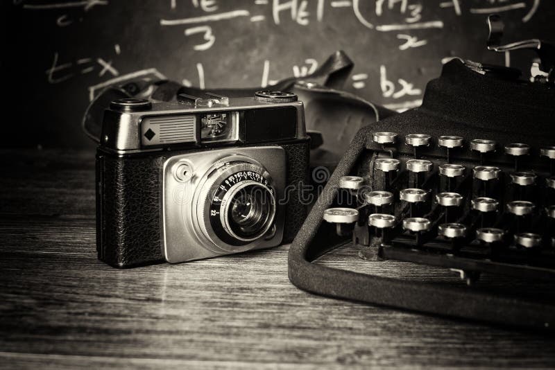 Old Vintage Retro Camera with Old-fashioned Typewriter Stock Photo ...