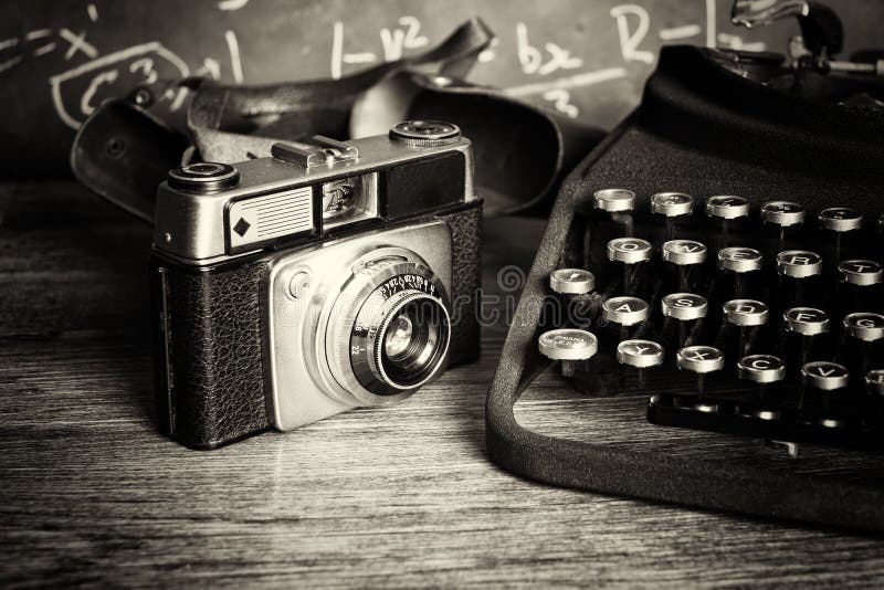 Old Vintage Retro Camera with Old-fashioned Typewriter Stock Photo ...
