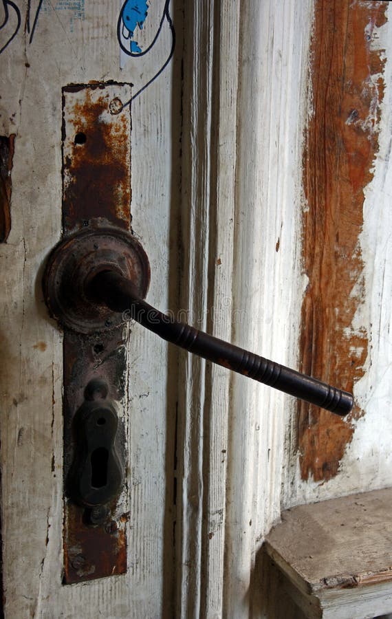 Old, Vintage Rusty Door Handle on an Aged White Door. Stock Image ...
