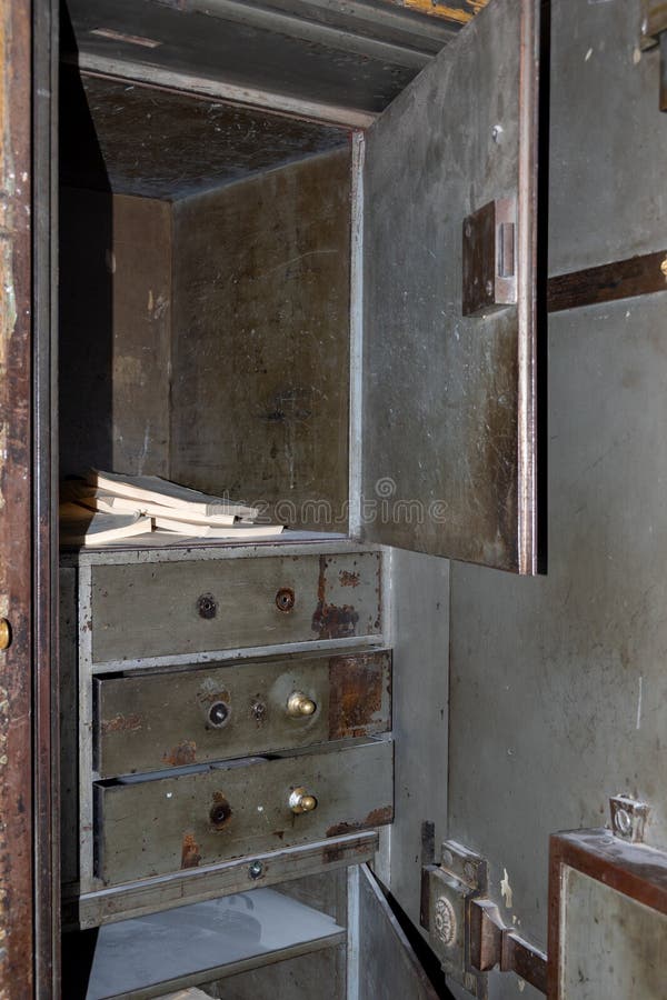 An Old Vintage Rusty Metal Safe with an Open Door. Antique Office Safe ...