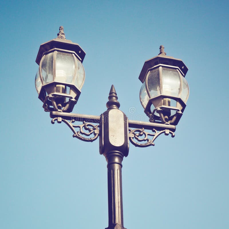 Old Vintage Street Light Against Blue Sky with Retro Effect Stock Photo ...