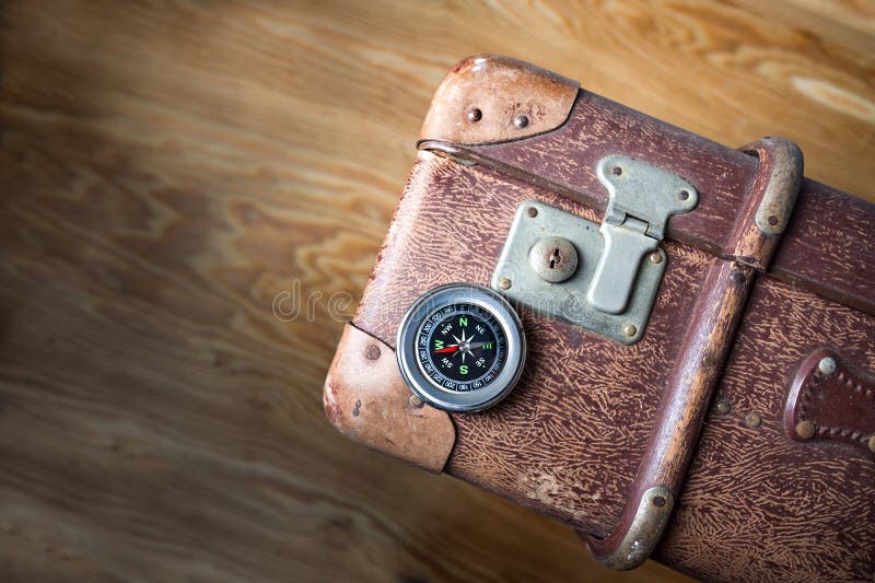 Old Vintage Suitcase with a Compass Seen from Above, Concept for Travel ...