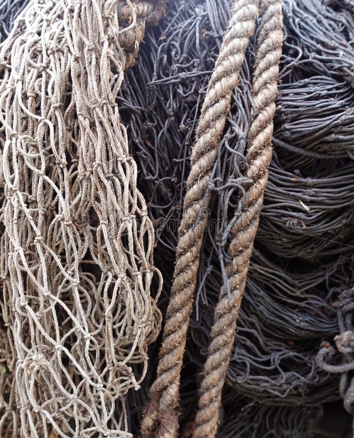 Old Vintage Texture of a Fishing Net Woven from a Thin Rope. Stock ...