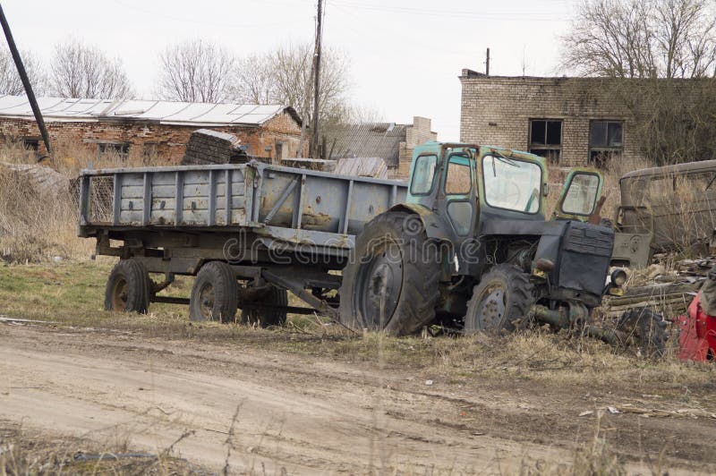 Old Vintage Tractor with Trailer Standing on the Sidelines Stock Image ...