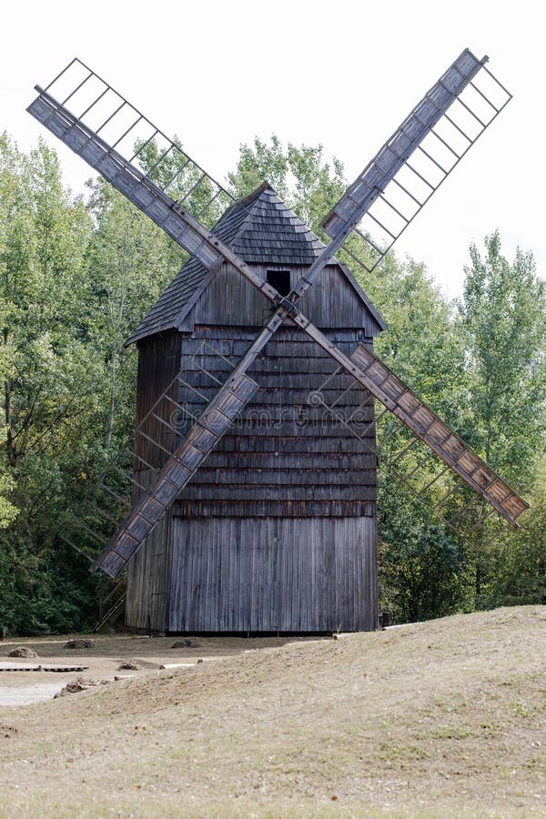 Old Vintage Windmill in a Village Stock Photo - Image of culture ...