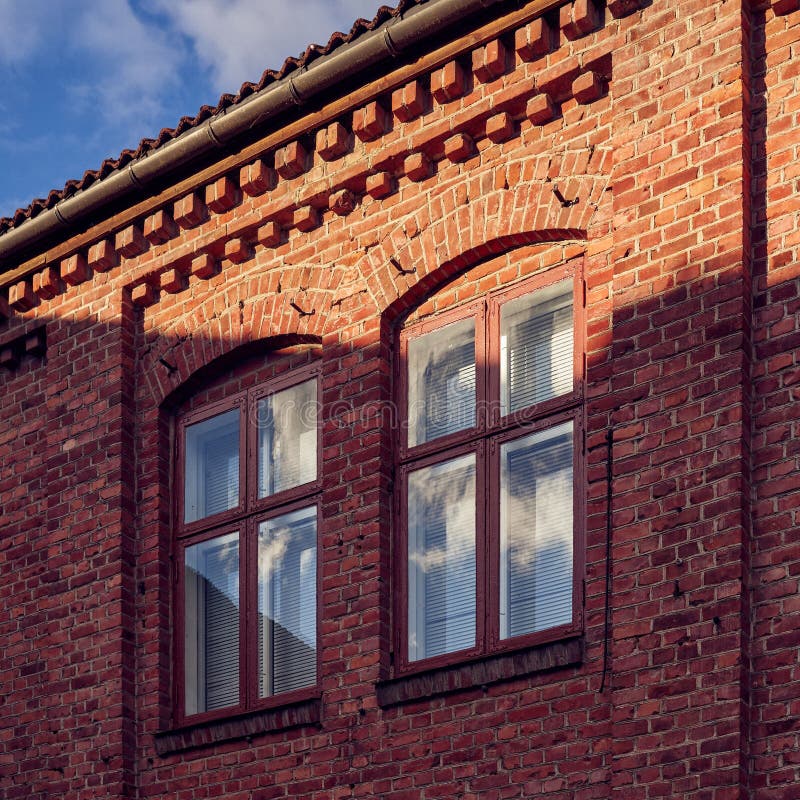 Old, Vintage Windows of a Red Brick Building Under the Sunlight Stock ...