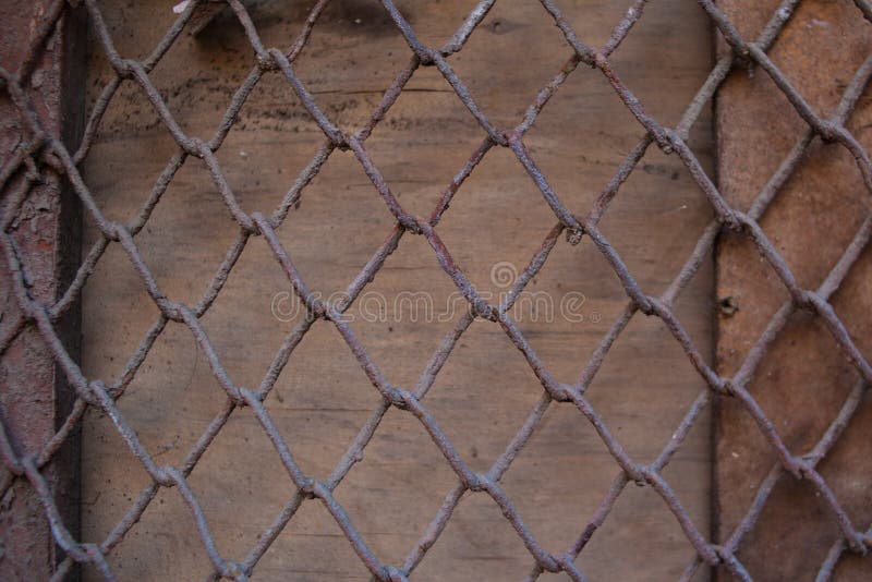 Old Vintage Wood Panel with Iron Grid Pattern. Mesh Fabric Stock Photo ...
