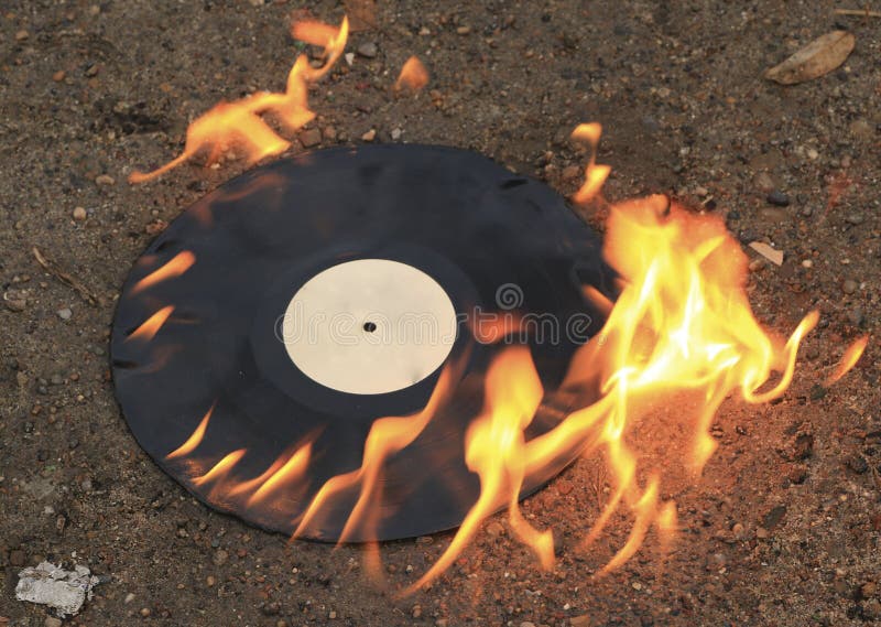 The Old Vinyl Black Plate Burns on a Stone Surface Stock Image - Image ...