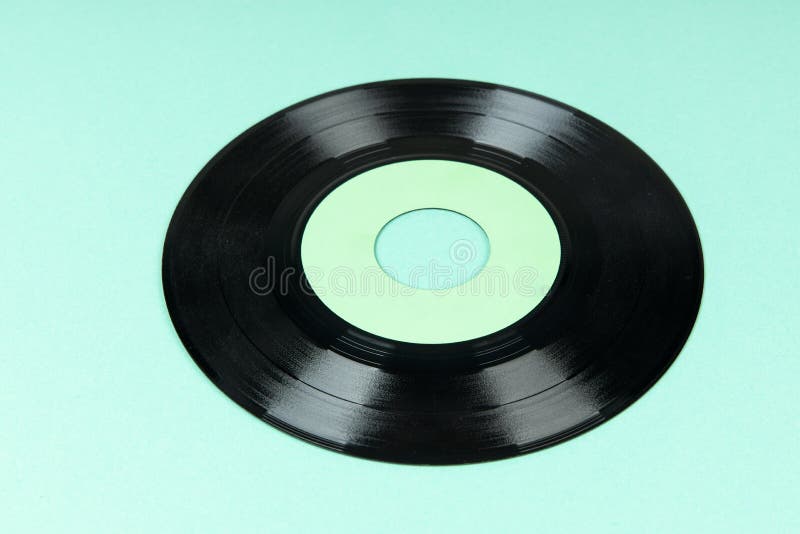 Old Vinyl Disc on Green Background. Old Vintage Vinyl Record Stock ...