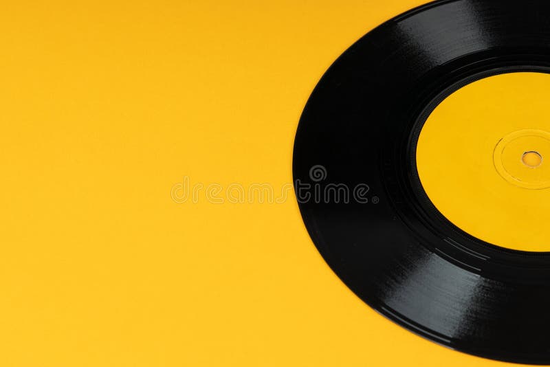Old Vinyl Disc on Yellow Background. Old Vintage Vinyl Record Stock ...