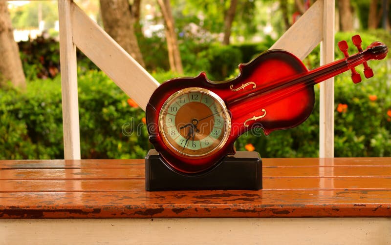 Violin shape clock stock image. Image of equipment, postcard - 156291707