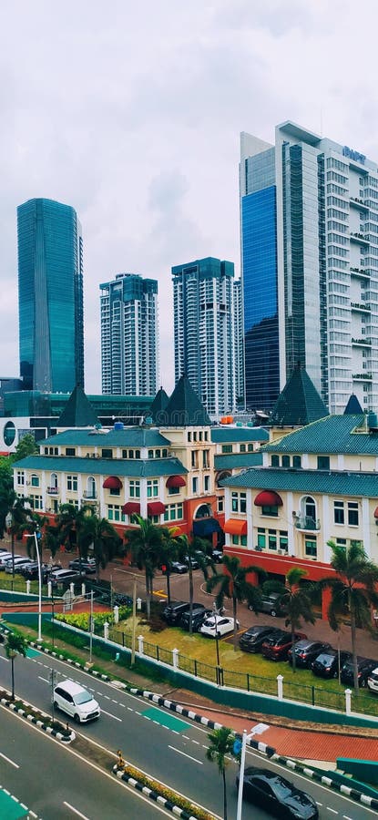 Old vs Modern Building editorial stock image. Image of street - 263256324