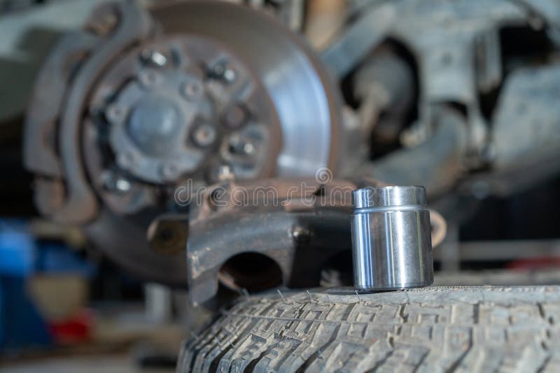 Old Vs New Disc Brake Caliper Piston. Stock Image - Image of mechanical ...