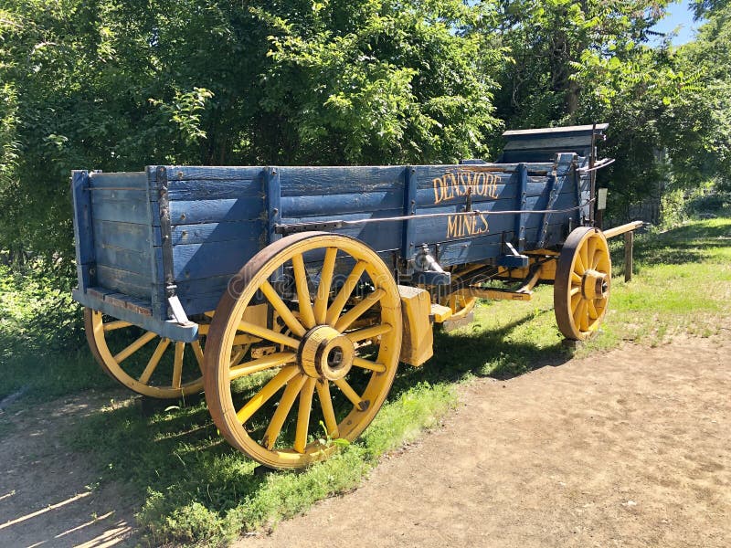 Wagon editorial photo. Image of town, trees, wagon, dirt - 162140736