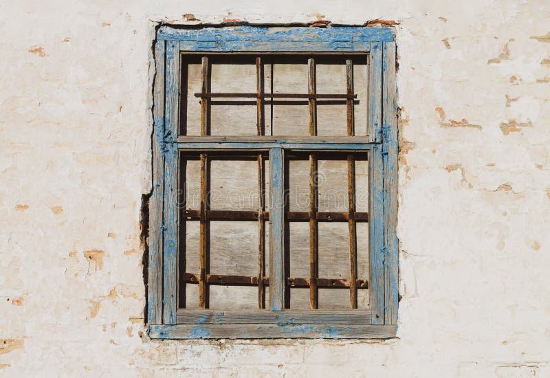 Old Wall and Closed Wooden Window with Rust Grille Stock Photo - Image ...
