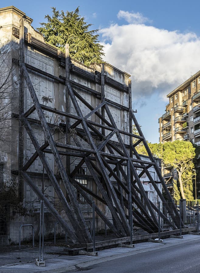 Old Wall is Falling Aparat and Has Supportive Wooden Structure Stock ...