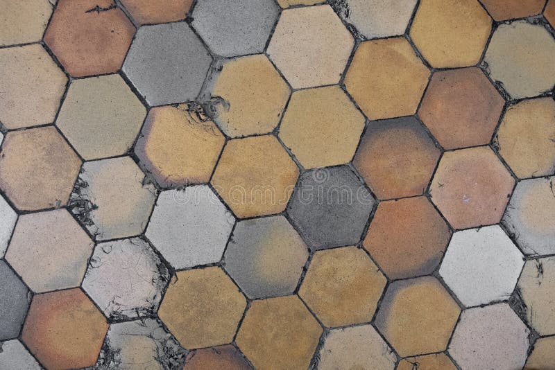 Old Wall of Gray and Yellow Hexagonal Tiles with Cracks. Rough Surface ...