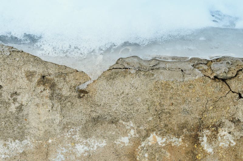 Old Wall Thaws Out of Ice and Snow Stock Image - Image of wall ...