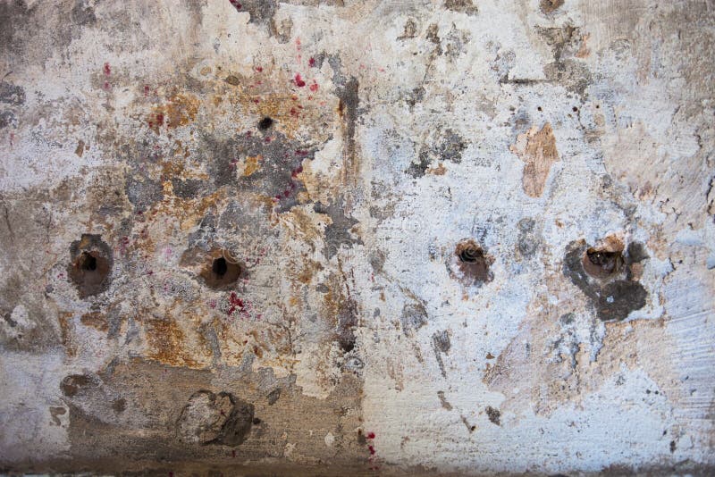 Old Wall with Visible Rusty Cut Edges of the Reinforcement Bars Stock ...