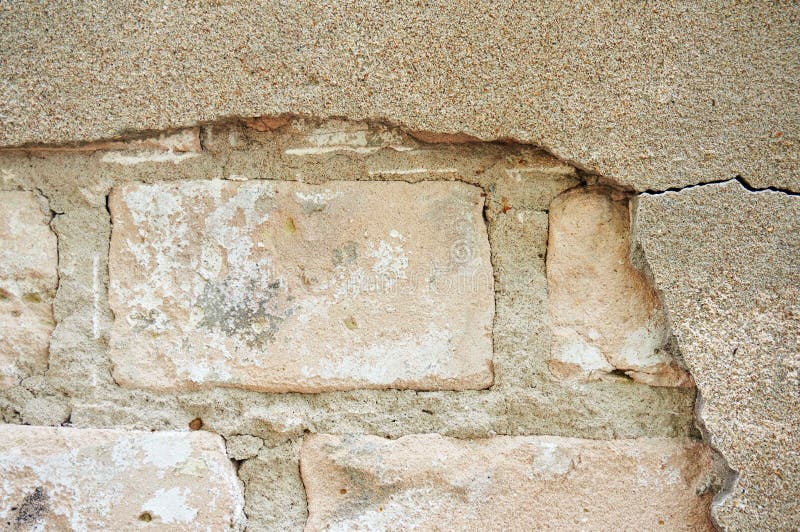 The Old Wall of White Brick with a Broken, Cracked Plaster. Abstract ...