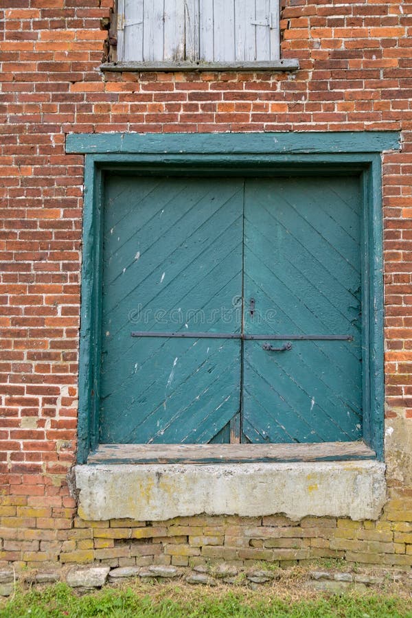 Old Warehouse Loading Door stock photo. Image of deteriorating - 115312458