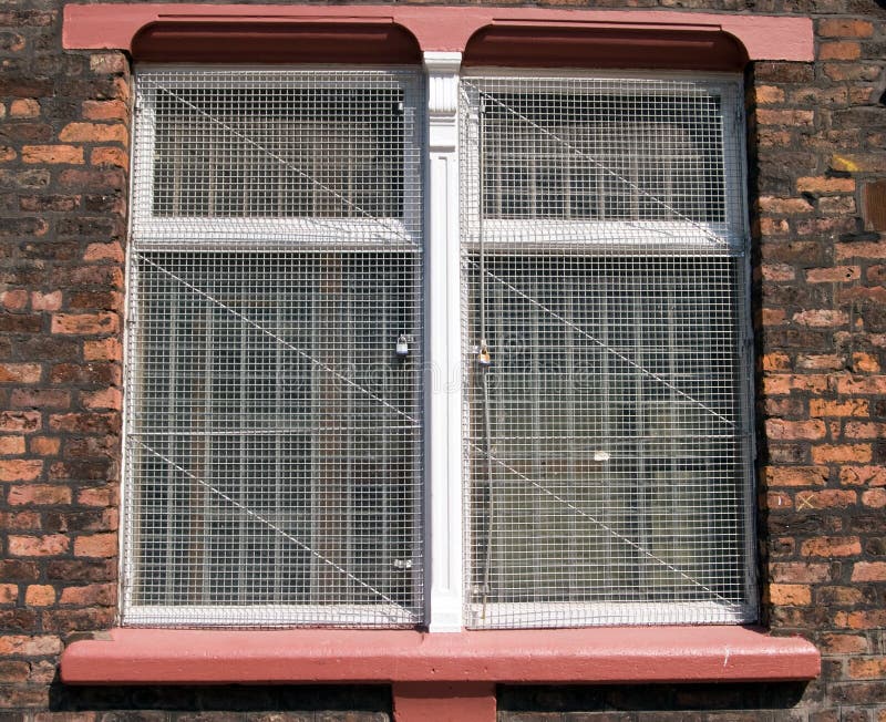 Old Warehouse Window Steel Mesh Stock Image - Image of outside, steel ...