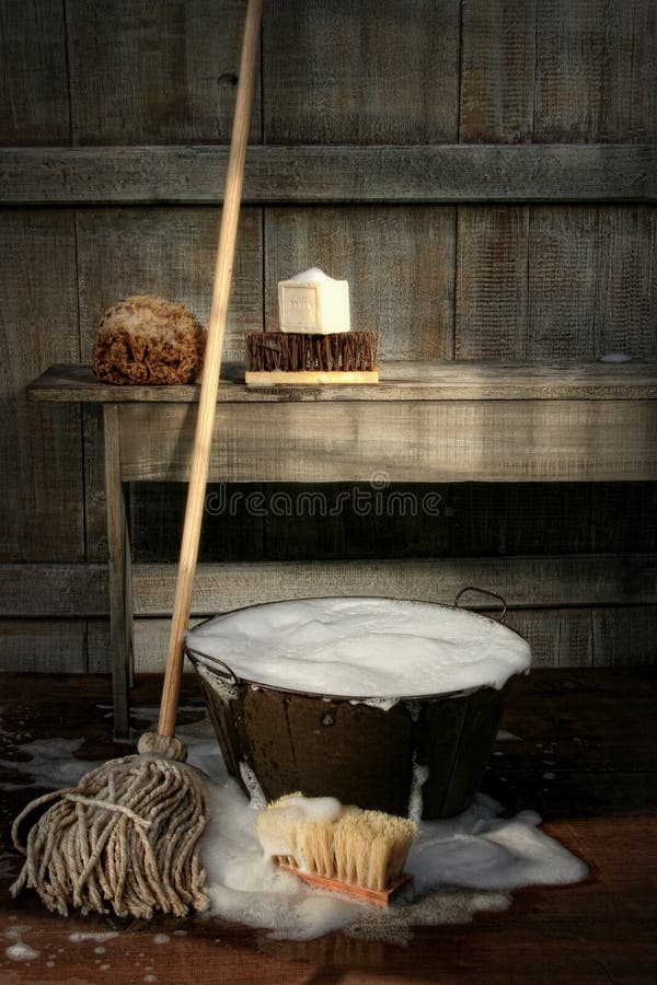 Old Wash Bucket with Mop and Brushes Stock Photo - Image of primitive ...