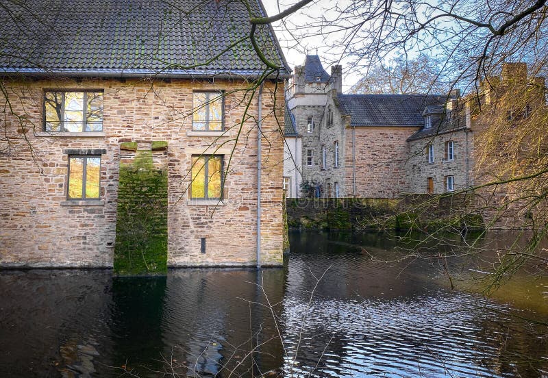 Old Water Castle with Trees and Reflections in Water Stock Image ...