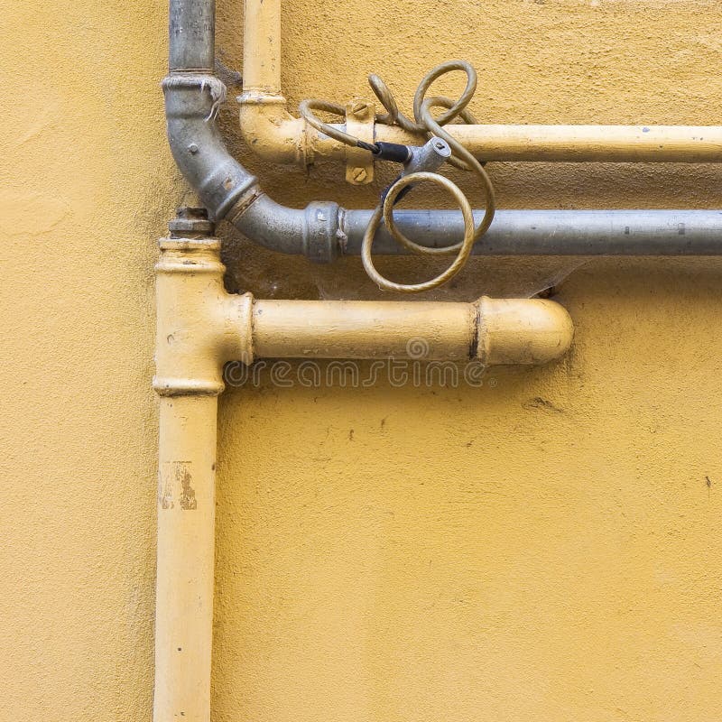 Old Water and Gas Pipes in Front of a Plaster Wall Stock Image - Image ...