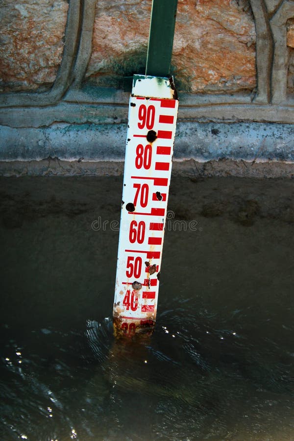 Old Water Level Gauge in a Channel Stock Photo - Image of marker, lines ...