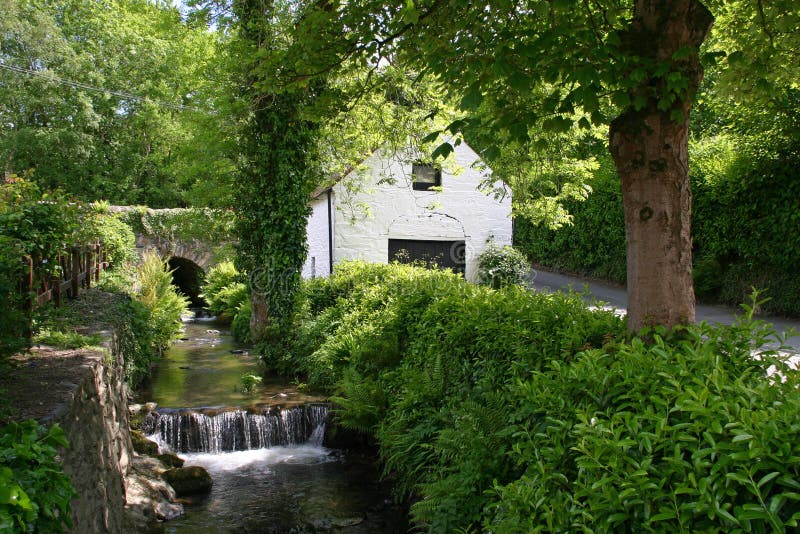 An Old Mill Made Out of Rock and Concrete Front View Stock Photo ...