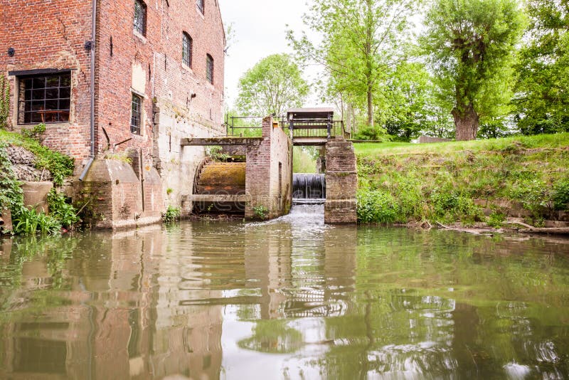 An Old Water Mill on the Water Stock Photo - Image of rustic, outdoors ...