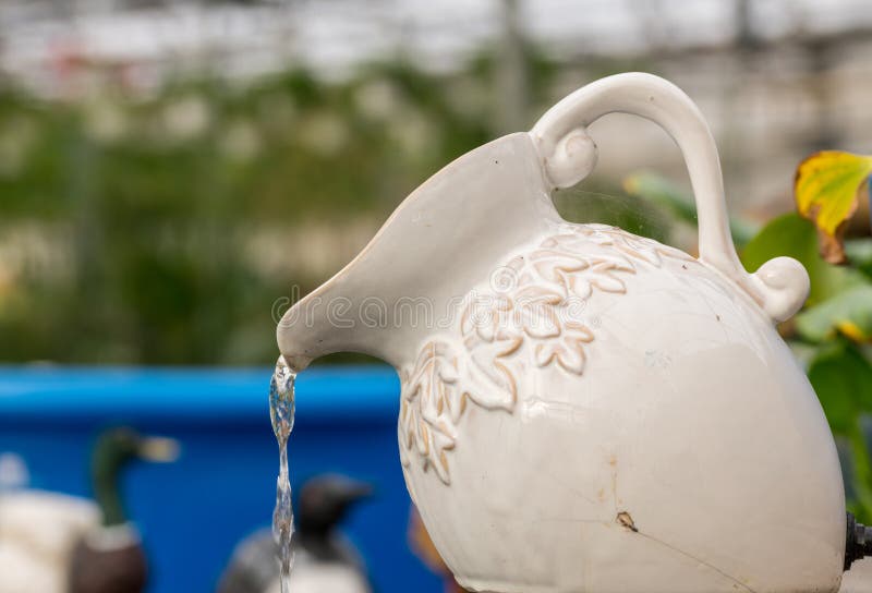 452 Hand Pouring Water Pitcher Stock Photos - Free & Royalty-Free Stock ...
