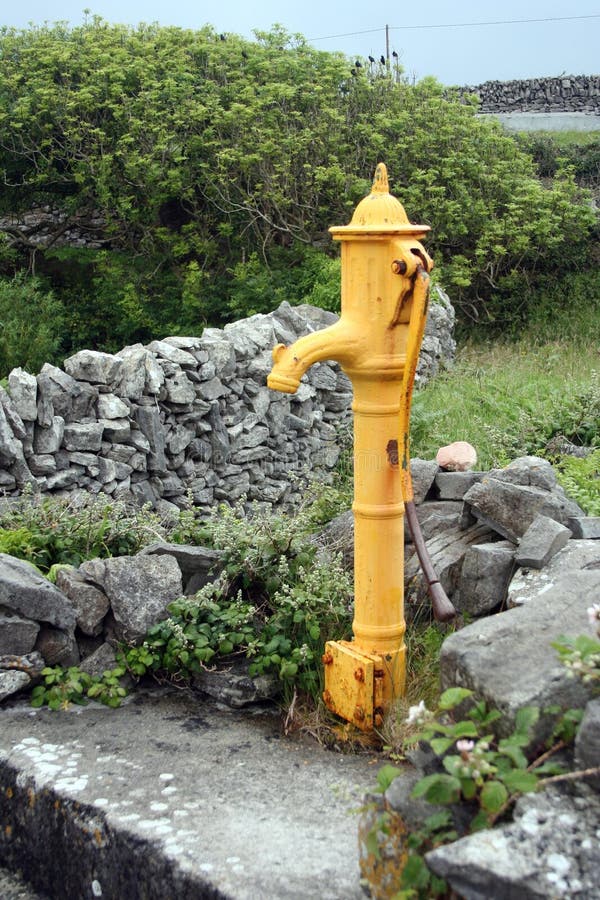 Old Water Pump stock image. Image of metal, handle, rock - 3363141