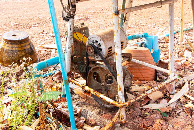 Old Water Pump Motor Drilling Groundwater from Underground on Floor and ...