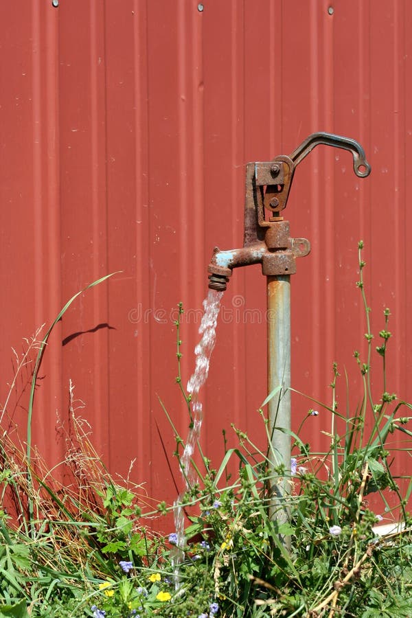 Old Water Spigot with Running Water Stock Image - Image of weeds ...
