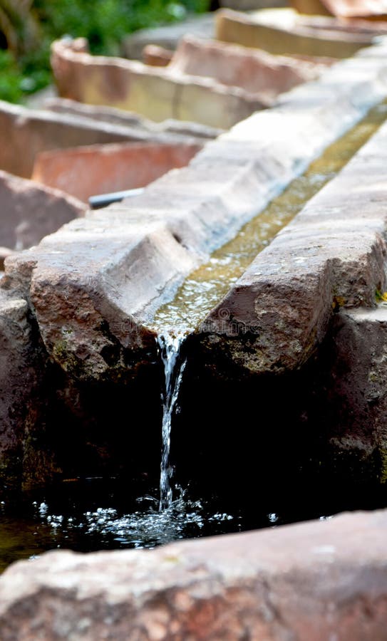 Old Water Stone Pipe with Fresh Water Running through it Stock Image ...