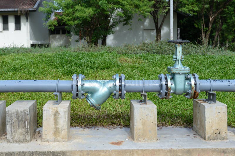 Old water supply pipeline stock photo. Image of curve - 100563912