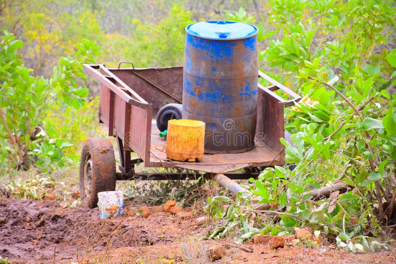 Old Water Tank Trailer in a Garden Stock Photo - Image of container ...