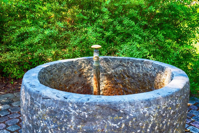 Old Water Tap with Concrete Well in the Park Stock Photo - Image of ...