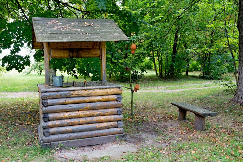 Old Water Well. stock image. Image of green, tree, traditional - 50952827