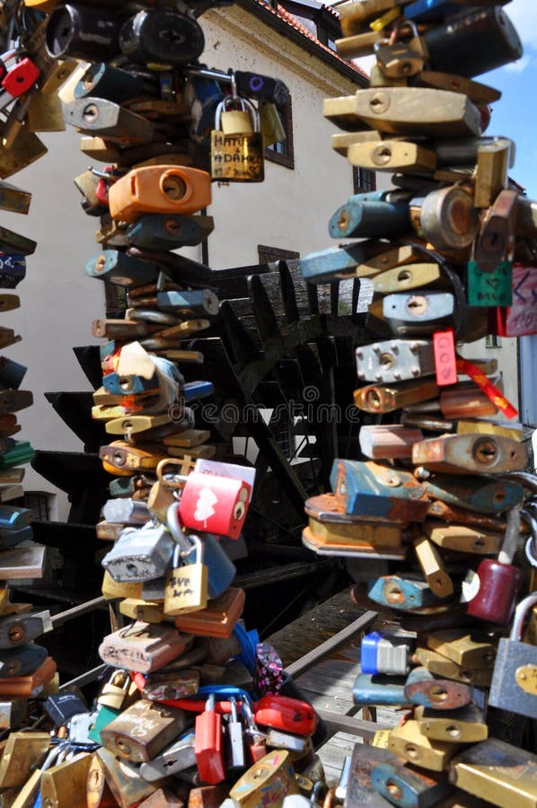 The Old Water Wheel and Locks of Lovers on the Bridge Stock Image ...