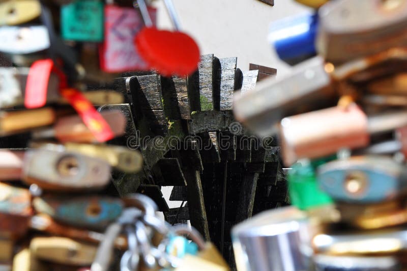 The Old Water Wheel and Locks of Lovers on the Bridge Stock Image ...