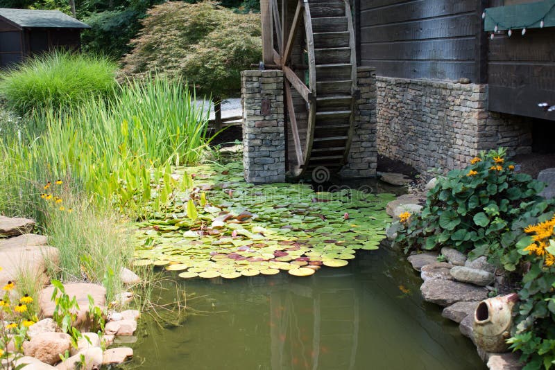 Old Water Wheel and Remaining Pond Stock Photo - Image of pond, pondn ...