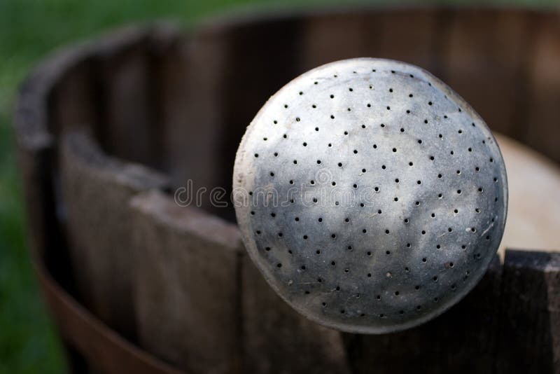 Old Watering Can in a Wood Barrel Stock Photo - Image of rose, inviting ...