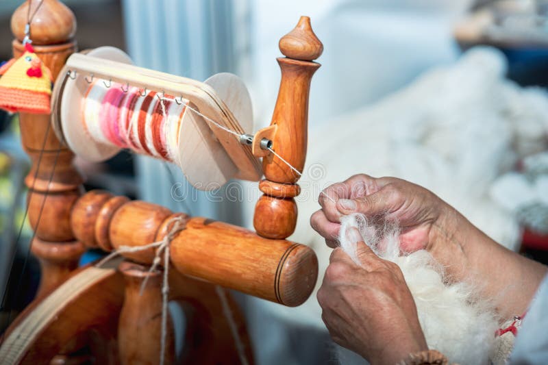 An Old Way of Creating a Woolen Thread, a Wooden Spinning Machine Stock ...