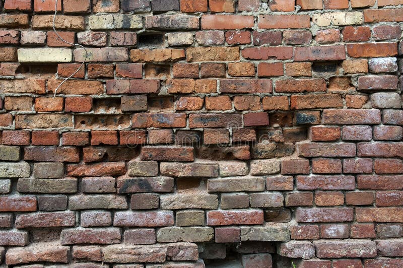 Old Weathered Brick Wall Made of Multi-colored Bricks Stock Image ...