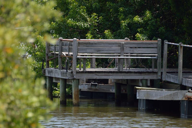 Old Weathered Dock on Waterway Stock Image - Image of waterway, trees ...
