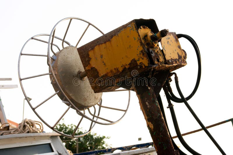 Old Fishing Net Spool on a Boat in a Harbor Stock Image - Image of life ...
